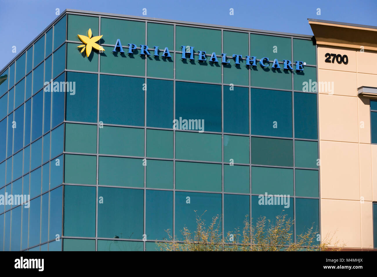 A logo sign outside of a facility occupied by Apria Healthcare Group ...