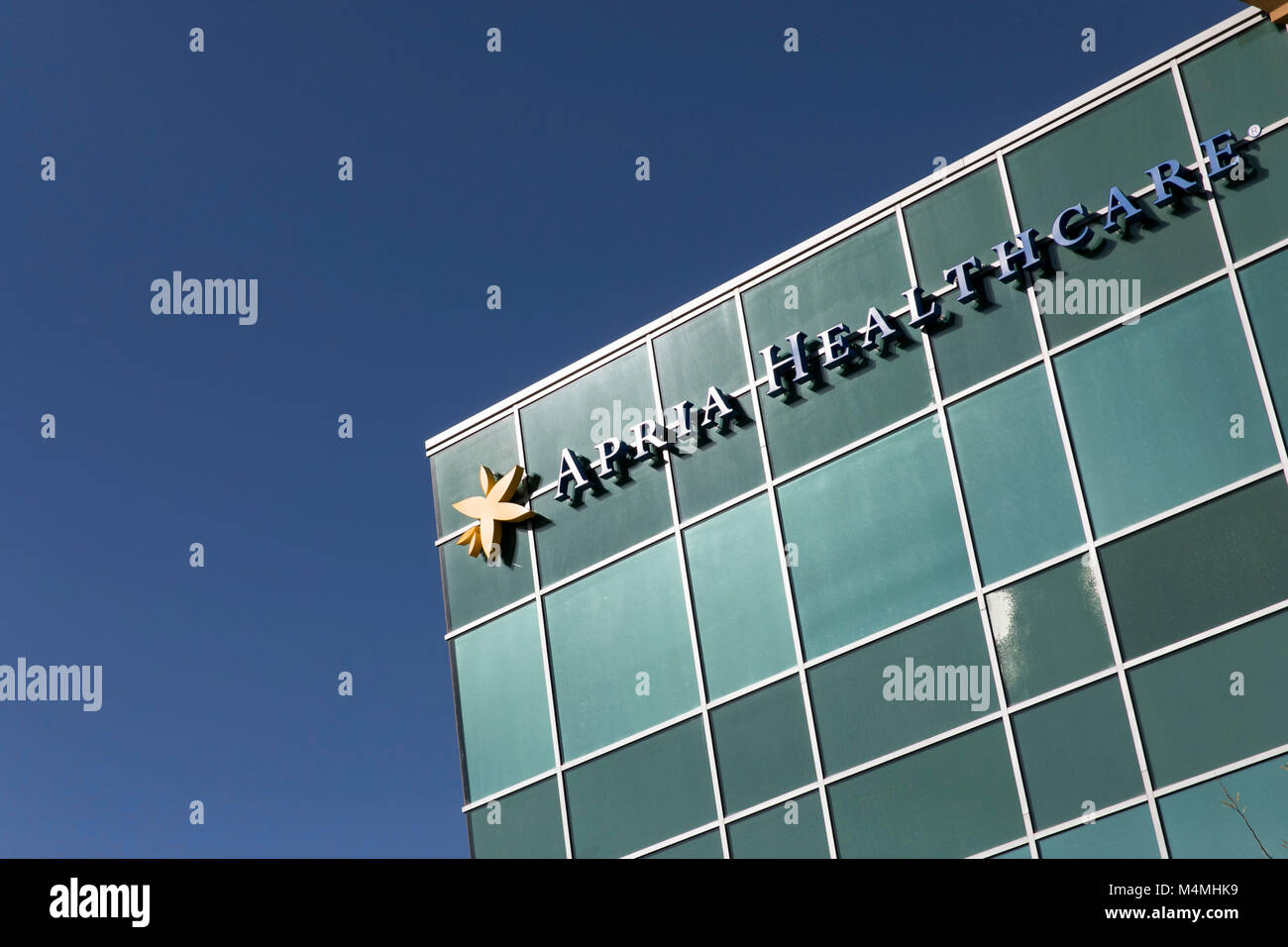 A logo sign outside of a facility occupied by Apria Healthcare Group ...