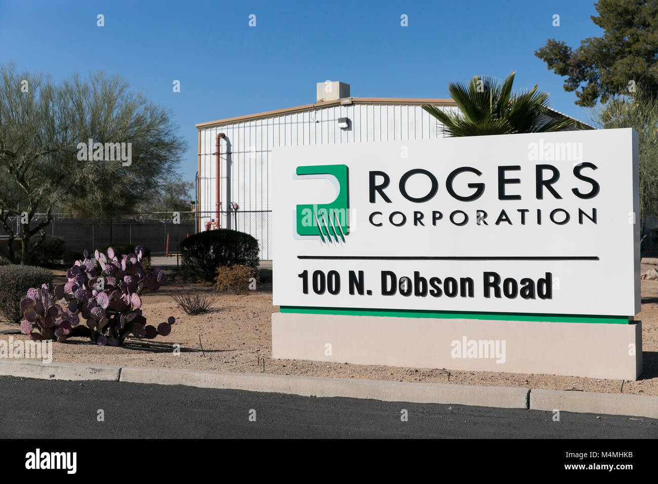 A logo sign outside of a facility occupied by the Rogers Corporation in ...