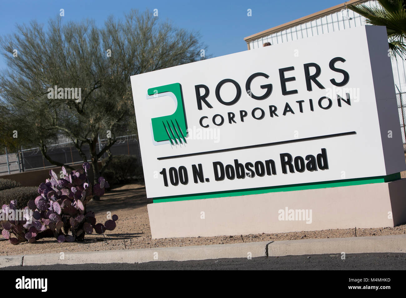 A logo sign outside of a facility occupied by the Rogers Corporation in ...