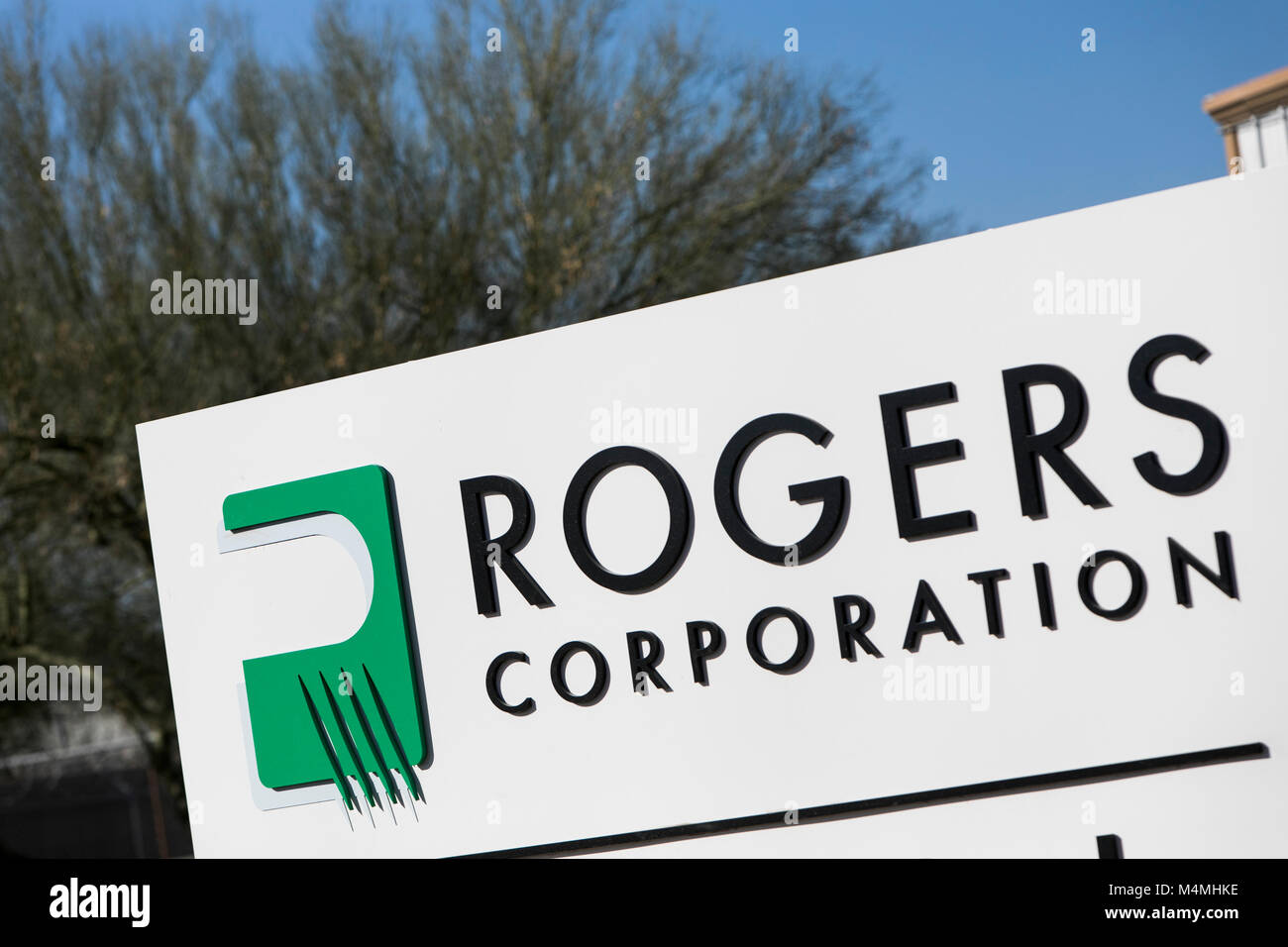 A logo sign outside of a facility occupied by the Rogers Corporation in ...