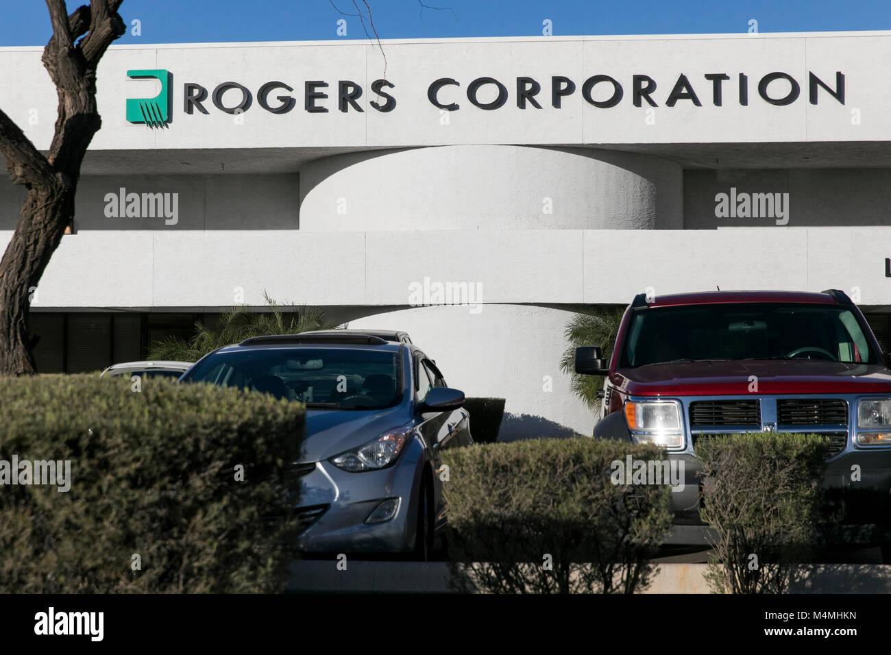 A logo sign outside of a facility occupied by the Rogers Corporation in ...