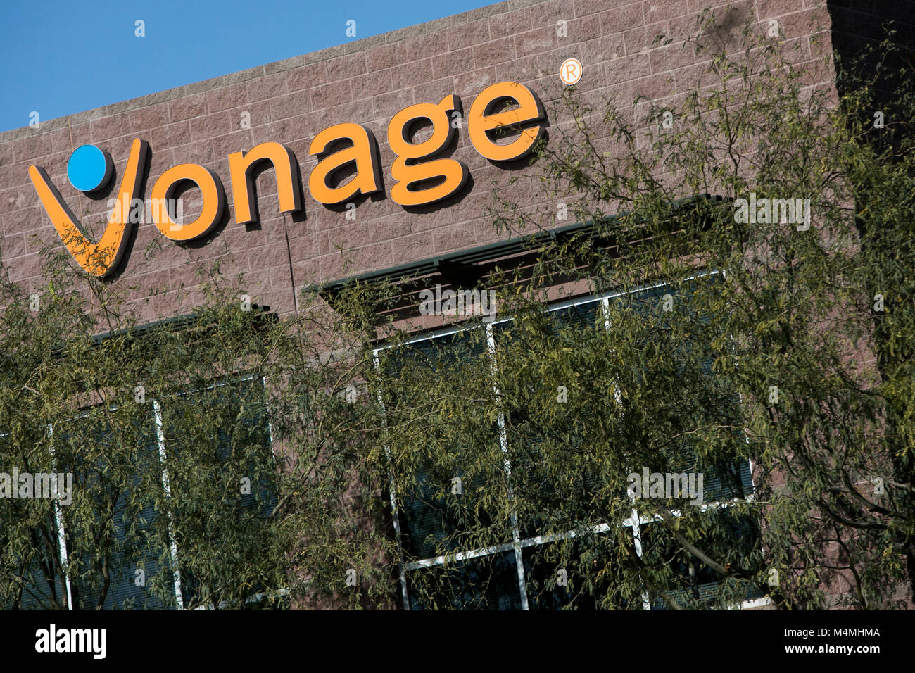 A logo sign outside of a facility occupied by Vonage Holdings Corp., in ...