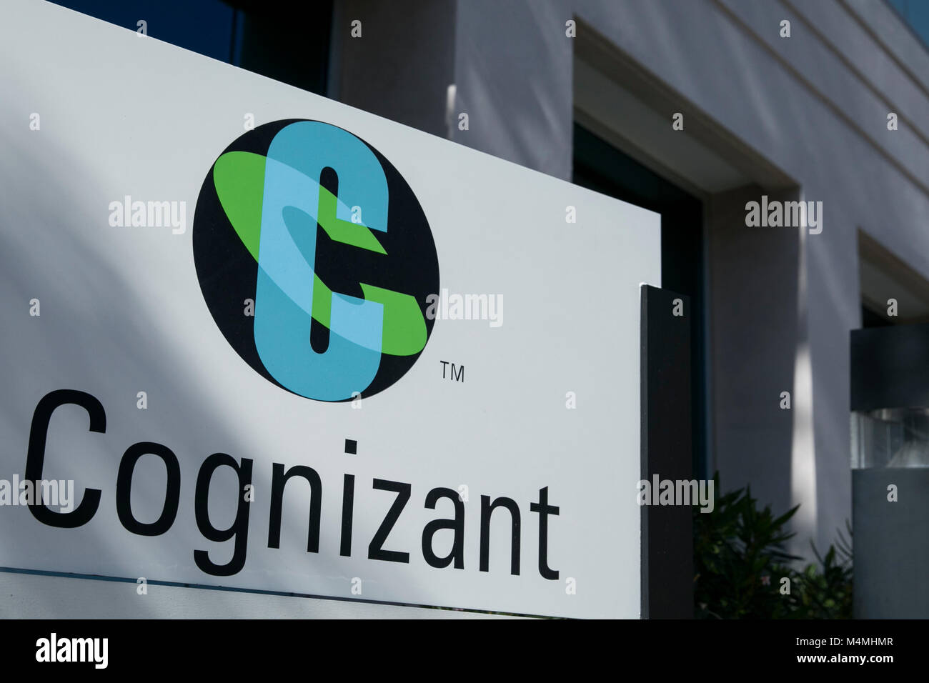 A logo sign outside of a facility occupied by Cognizant in Phoenix ...