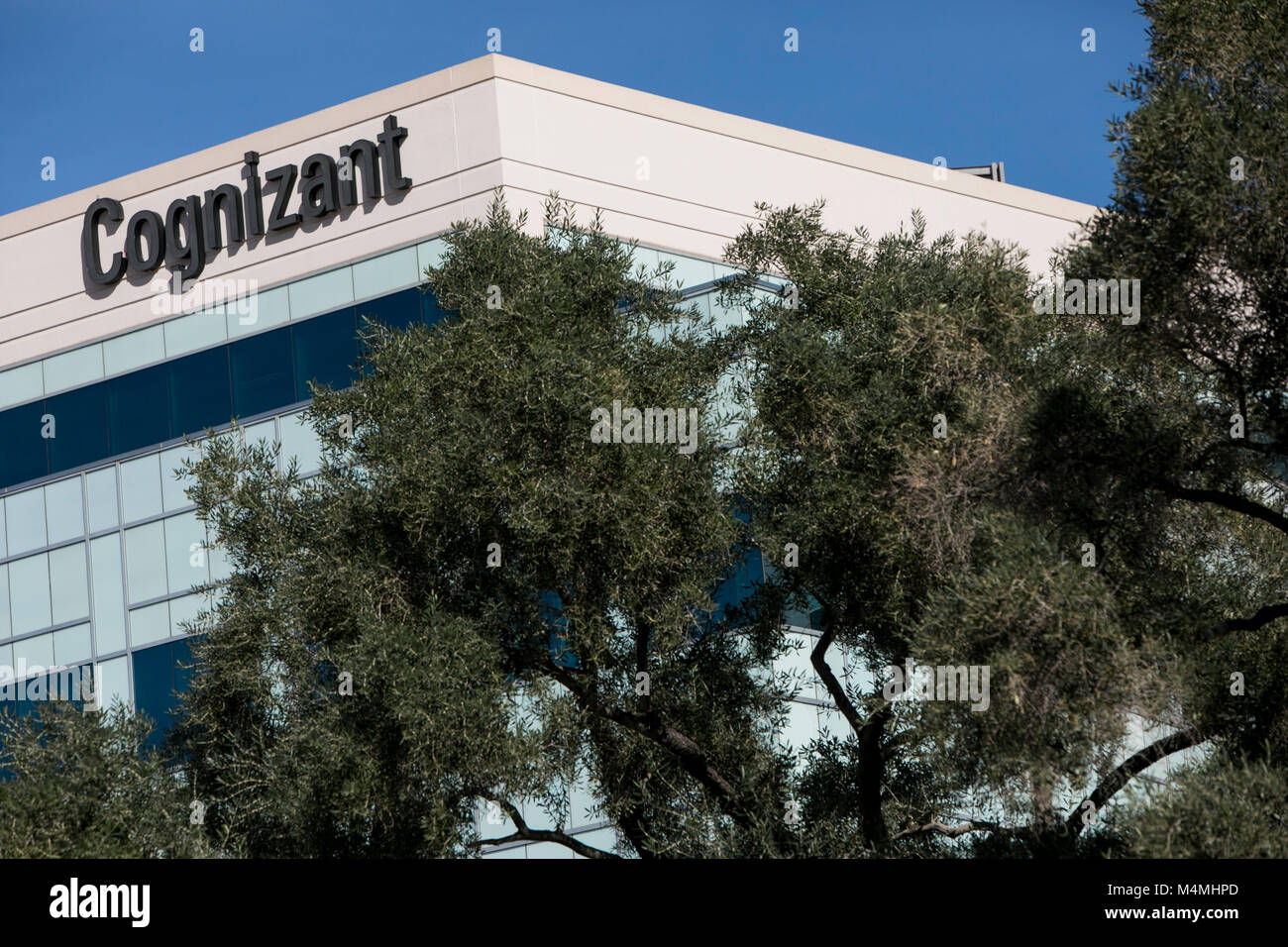 A logo sign outside of a facility occupied by Cognizant in Phoenix ...