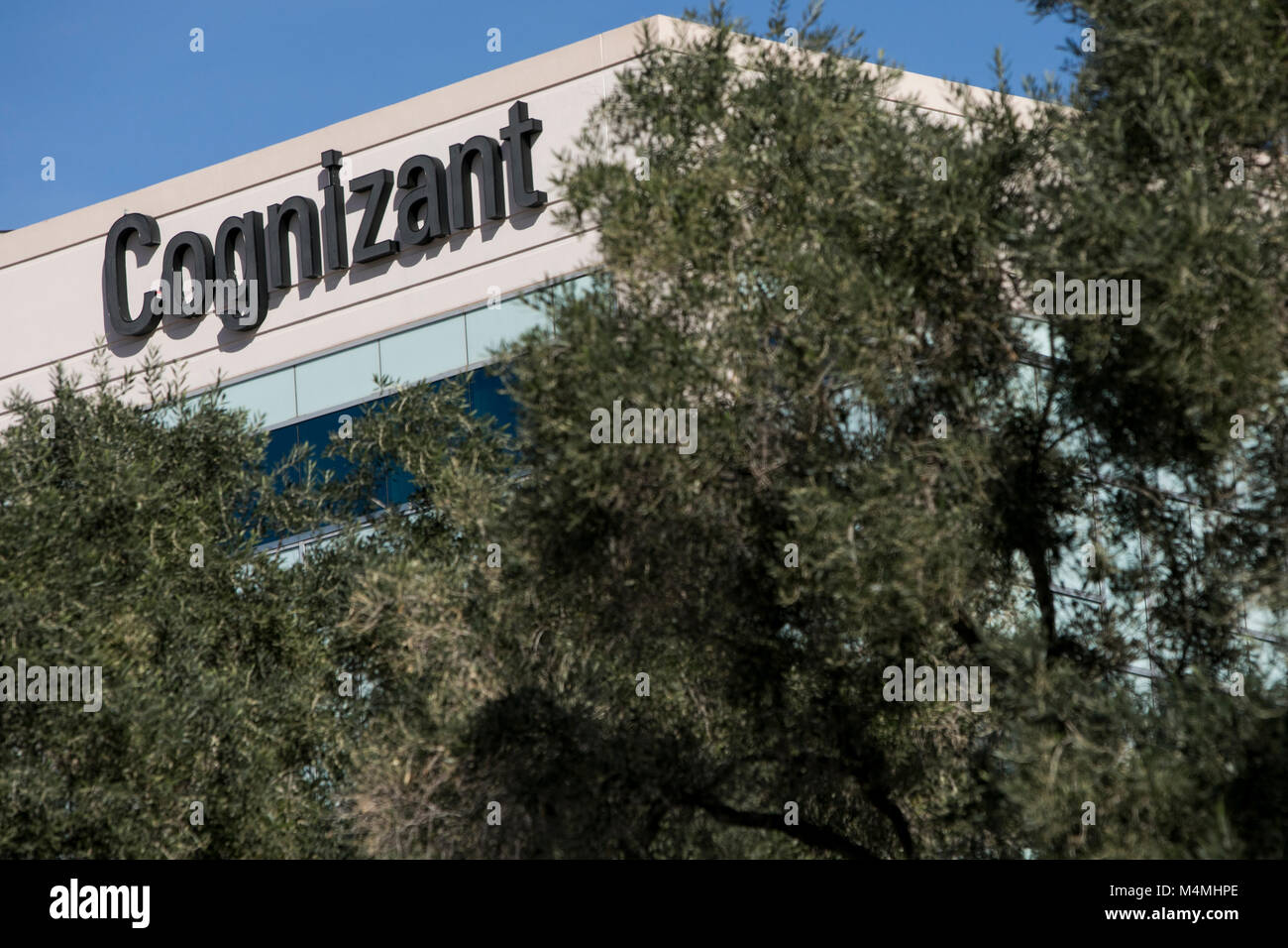 A logo sign outside of a facility occupied by Cognizant in Phoenix ...