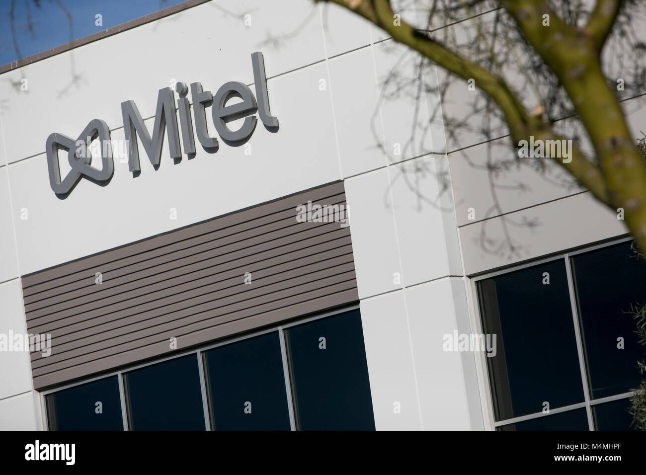 A logo sign outside of a facility occupied by Mitel Networks in Mesa ...