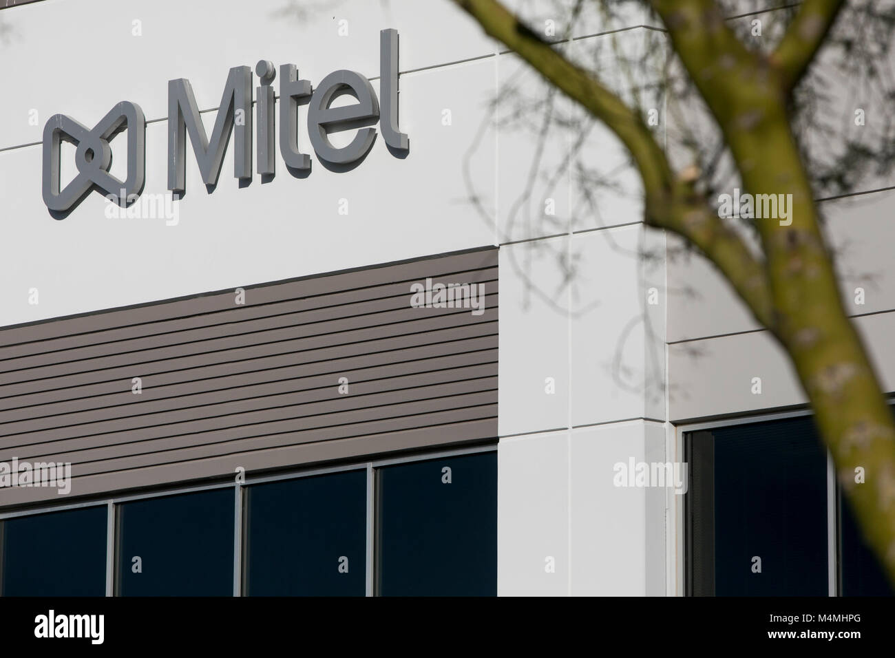 A logo sign outside of a facility occupied by Mitel Networks in Mesa ...