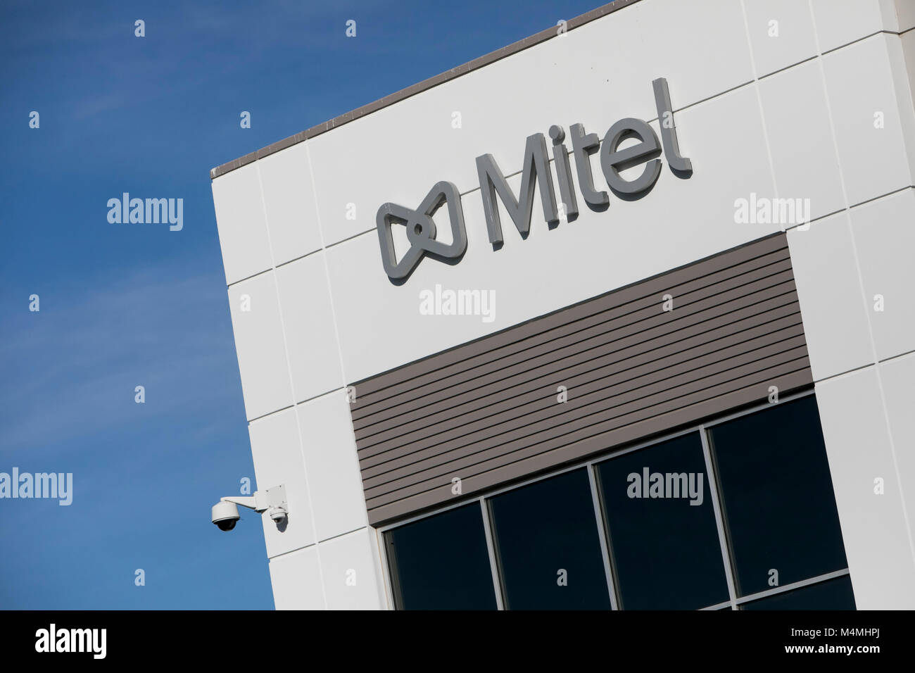 A logo sign outside of a facility occupied by Mitel Networks in Mesa ...
