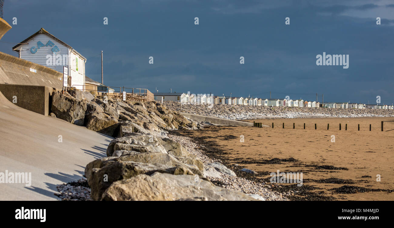 Dark skies over Brean Beach cafe below Brean Down in Somerset UK with ...