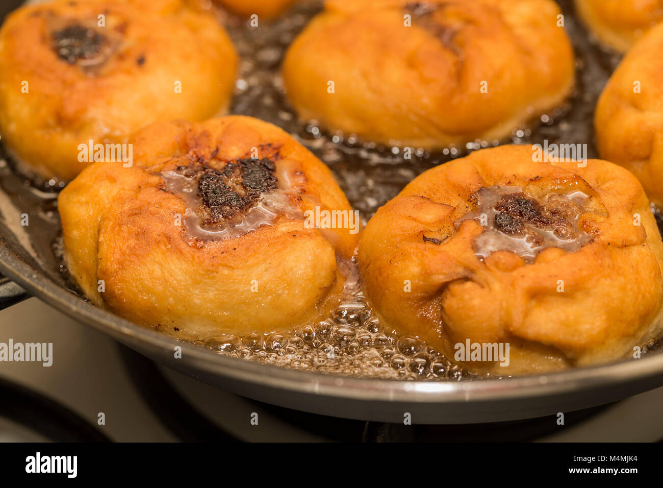 Traditional Russian pie with meat (belyash). Copy space Stock Photo - Alamy