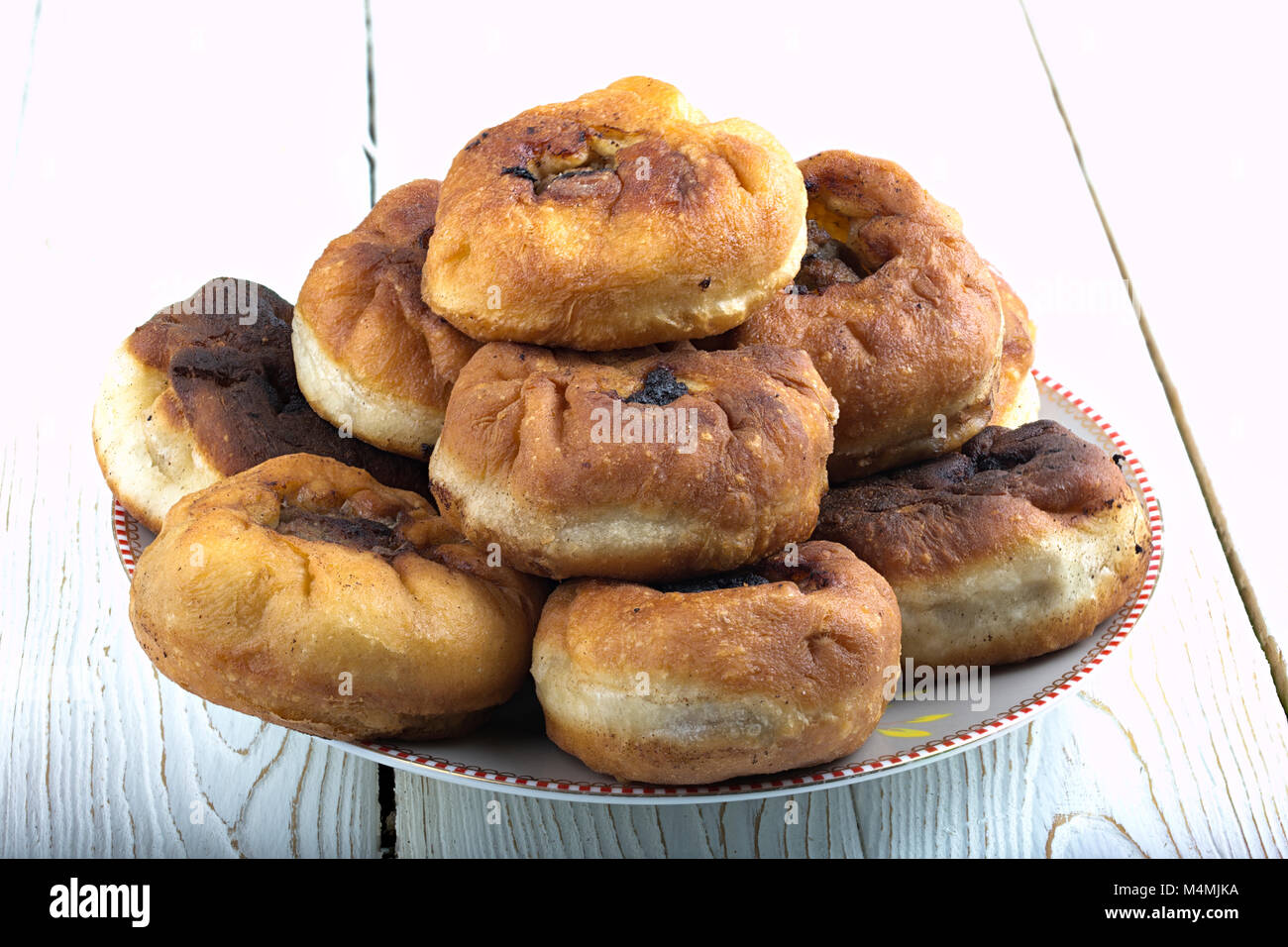 Traditional Russian pie with meat (belyash). Copy space Stock Photo - Alamy