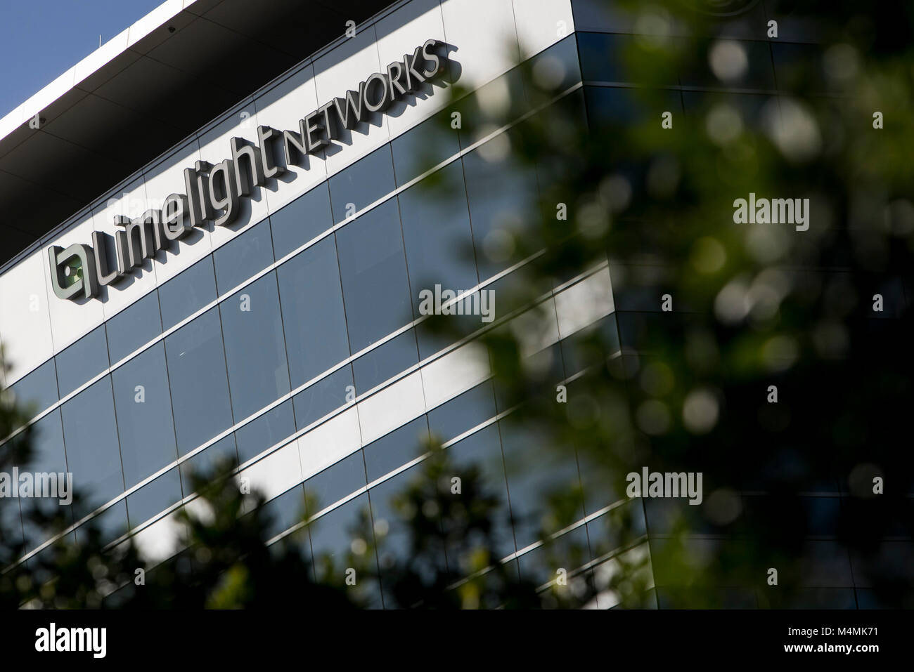 A logo sign outside of the headquarters of Limelight Networks in Tempe ...