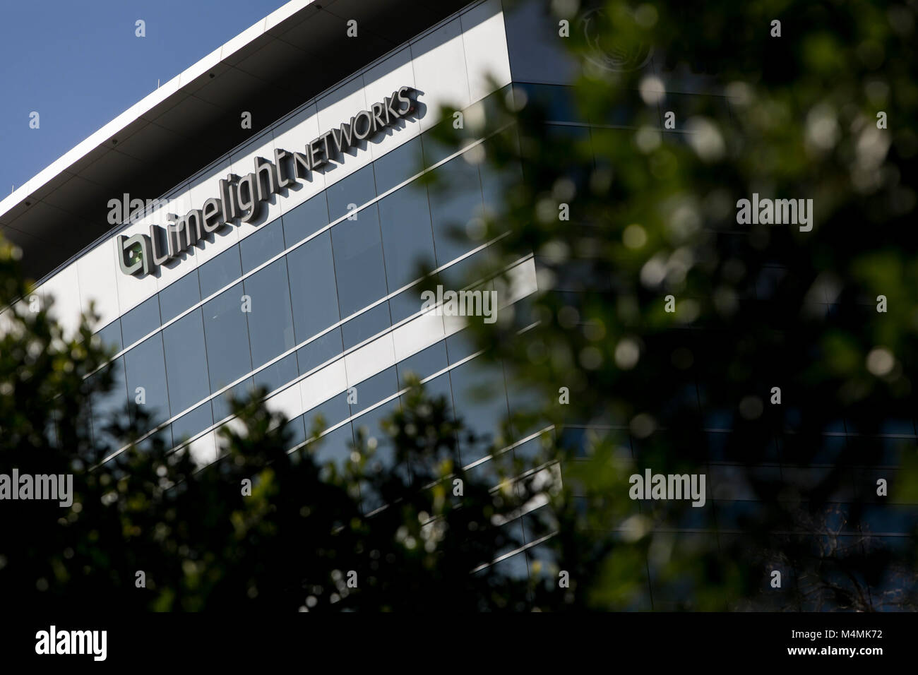 A logo sign outside of the headquarters of Limelight Networks in Tempe ...