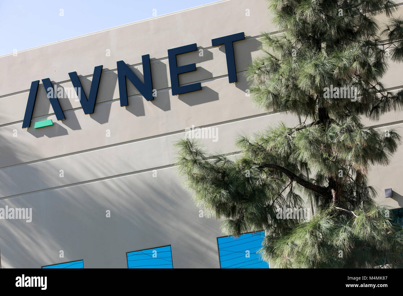 A logo sign outside of the headquarters of Avnet, Inc., in Phoenix ...