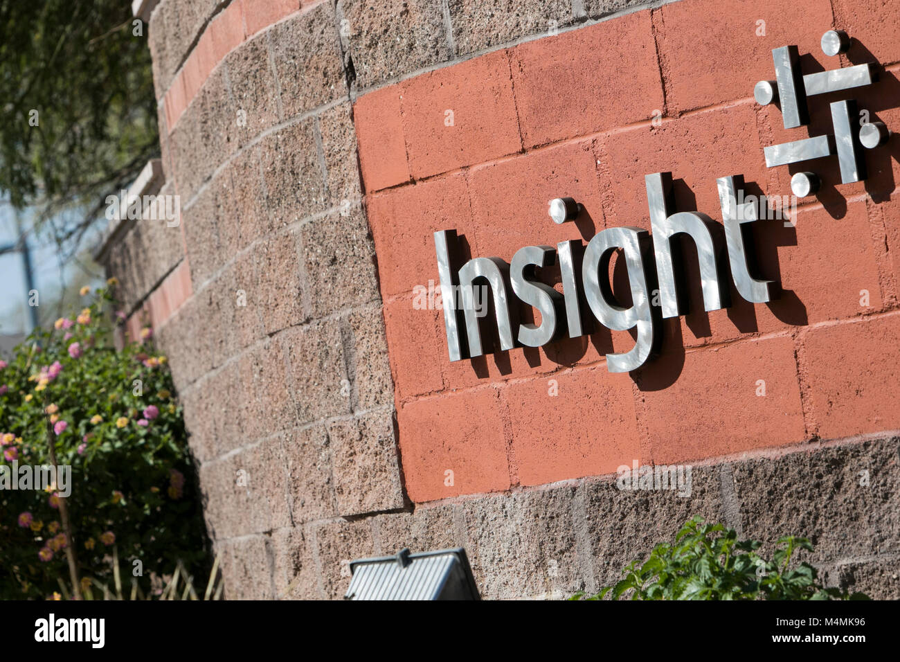 A logo sign outside of the headquarters of Insight Enterprises in Tempe ...