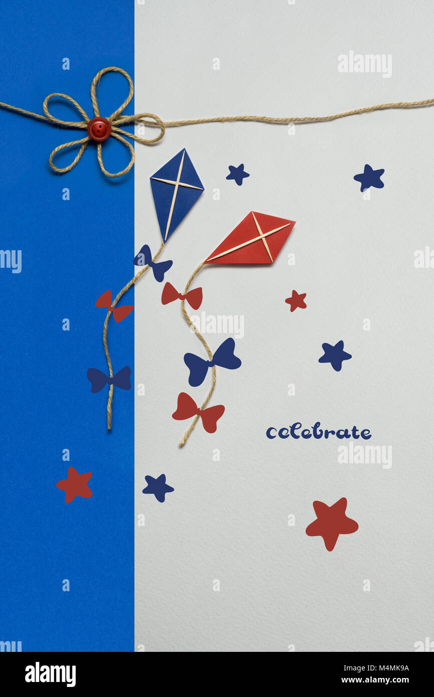 Creative concept photo of two kites made of paper on white blue ...