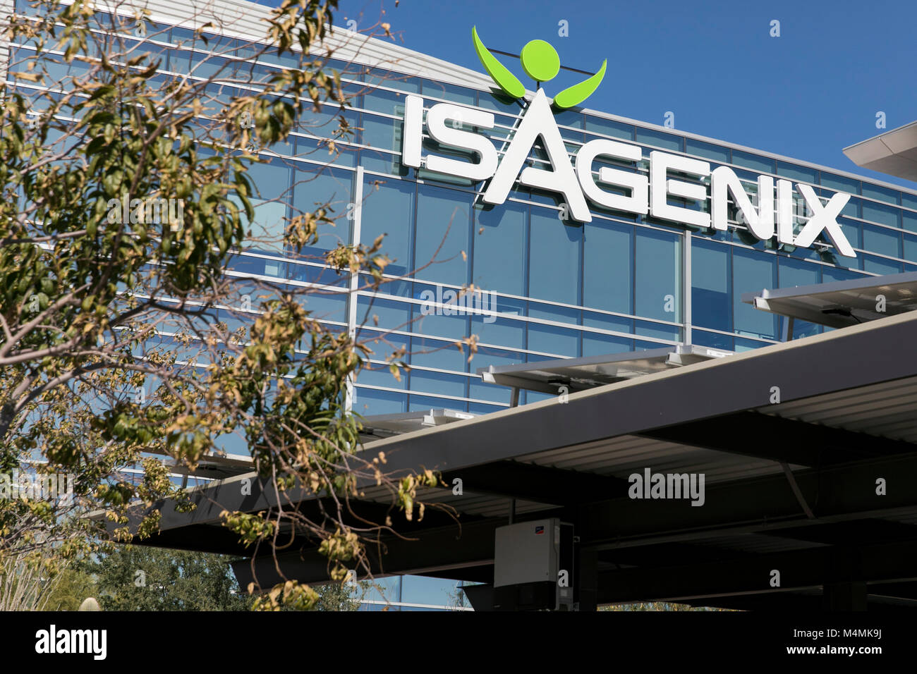 A logo sign outside of the headquarters of Isagenix International in ...