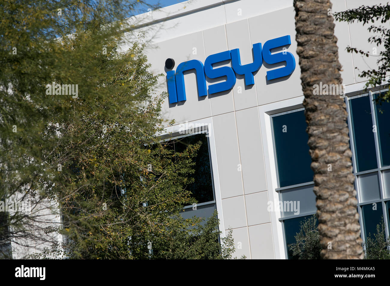 A logo sign outside of the headquarters of Insys Therapeutics in ...