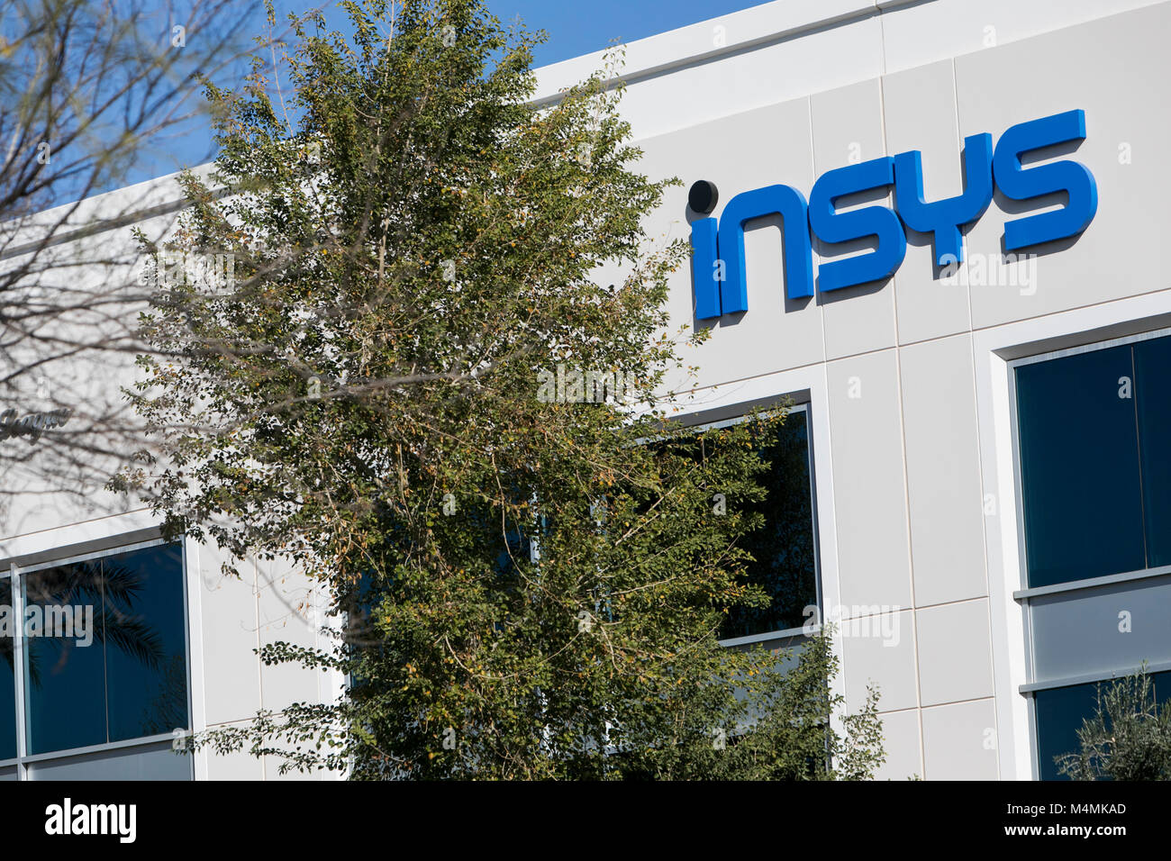 A logo sign outside of the headquarters of Insys Therapeutics in ...