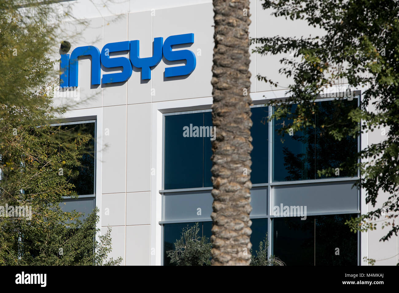 A logo sign outside of the headquarters of Insys Therapeutics in ...