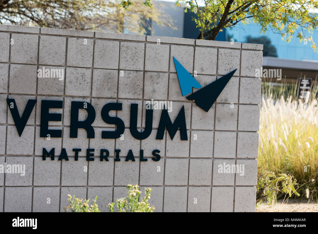 A logo sign outside of a the headquarters of Versum Materials in Tempe ...