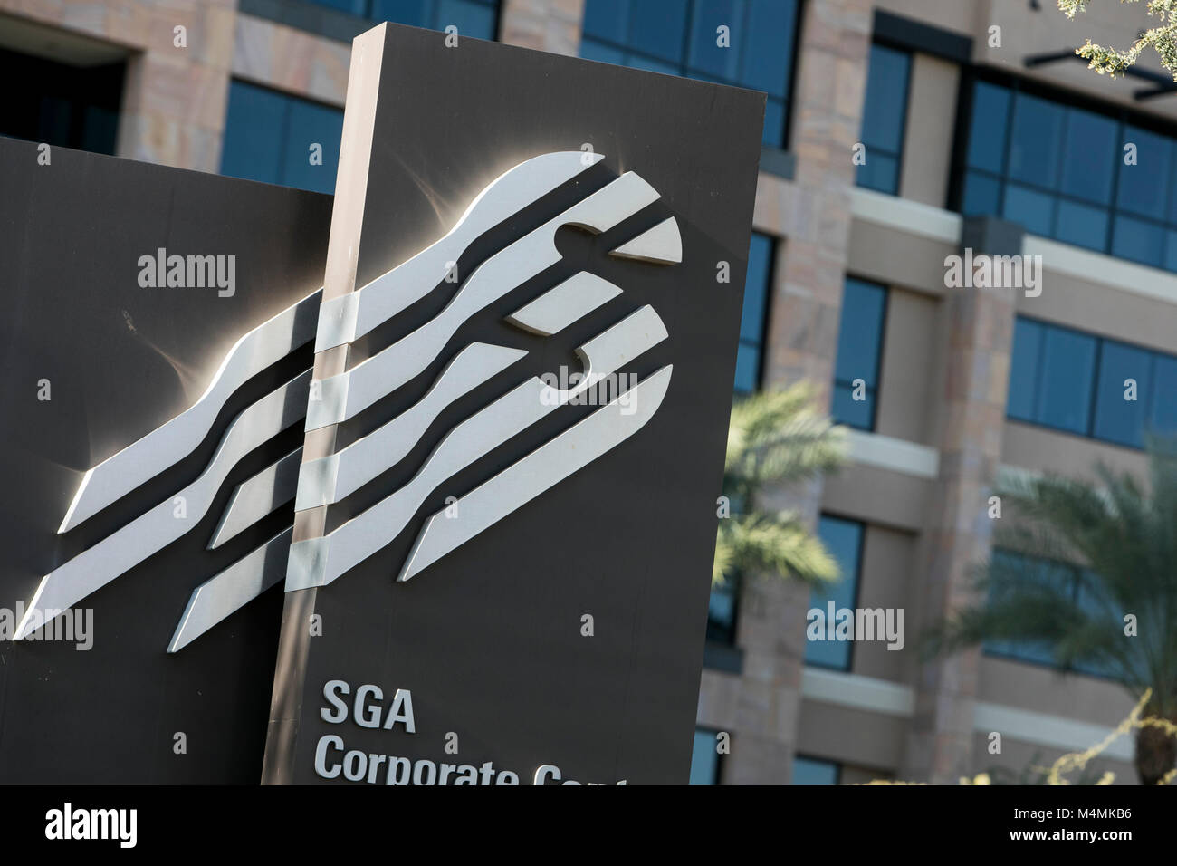 A logo sign outside of the headquarters of the Services Group of ...
