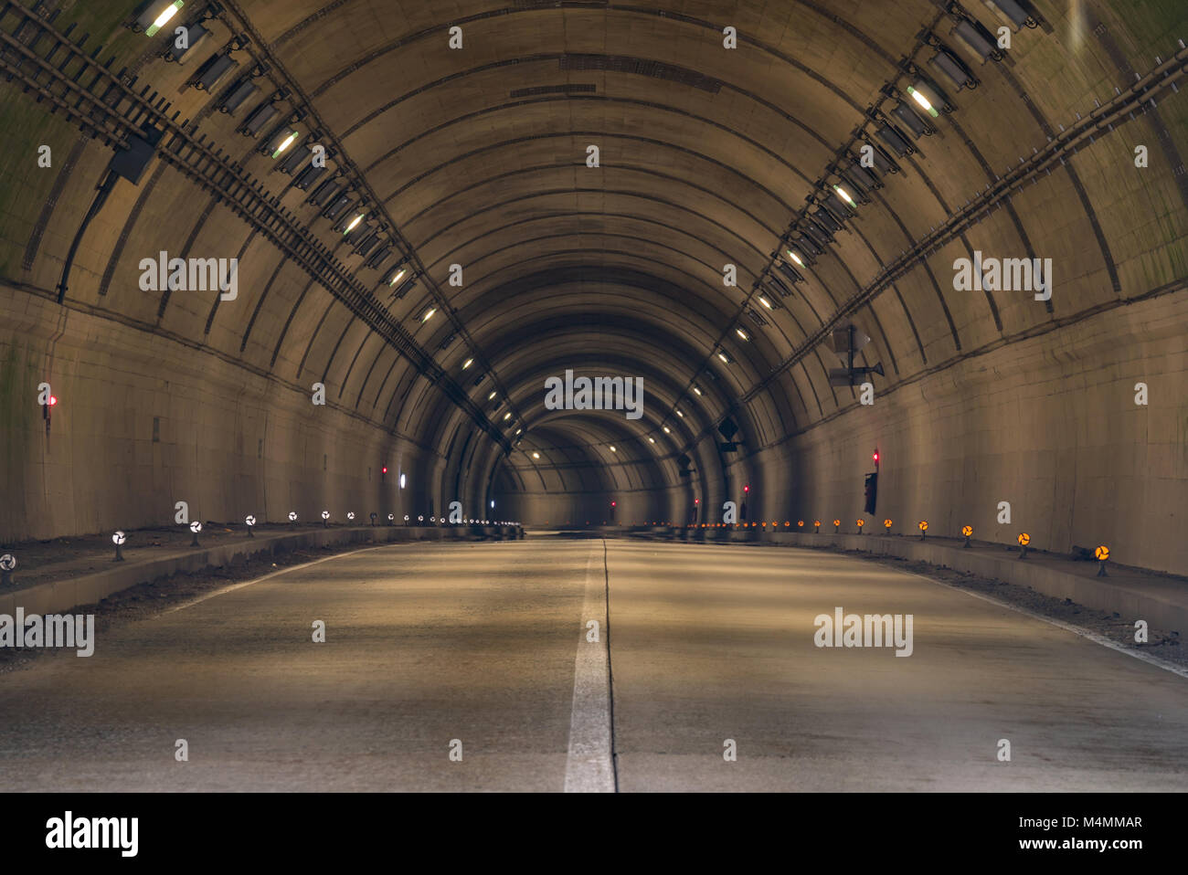 Tunnel Road with two lane highway Stock Photo - Alamy