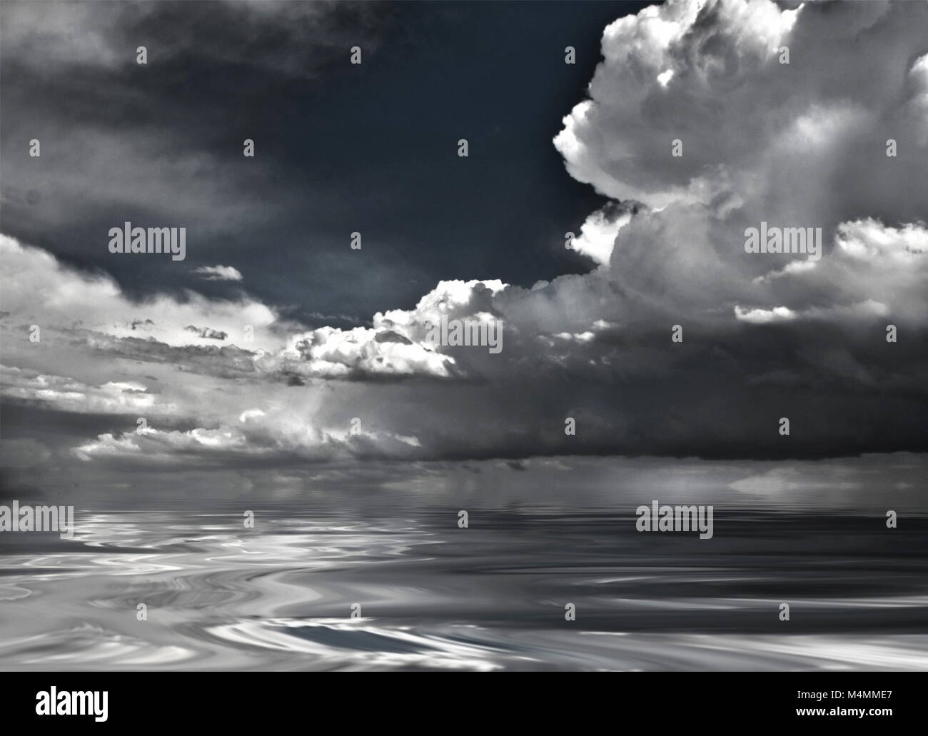Dramatic clouds reflected in water surface Stock Photo - Alamy