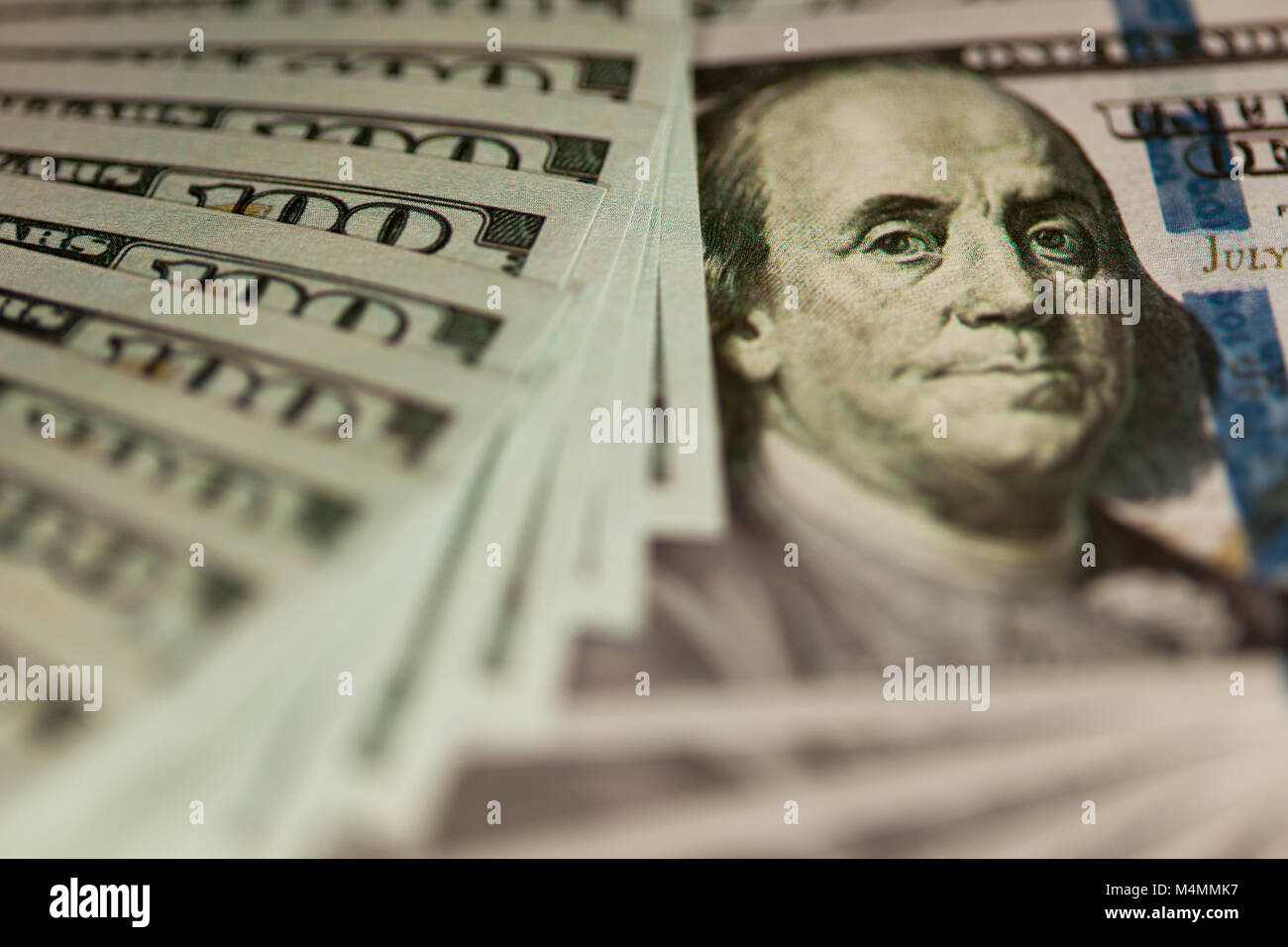 close-up image of an American president on a 100 dollar bill and cache ...