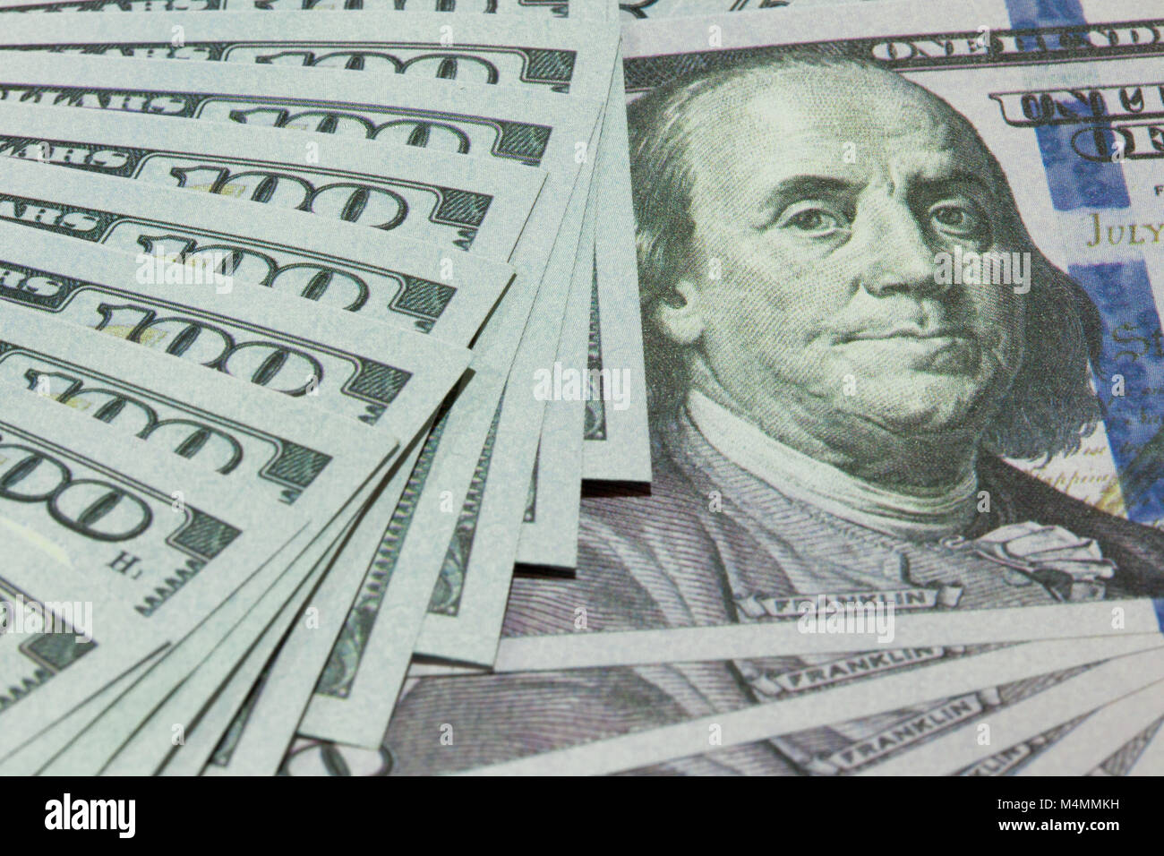 close-up image of an American president on a 100 dollar bill and cache ...