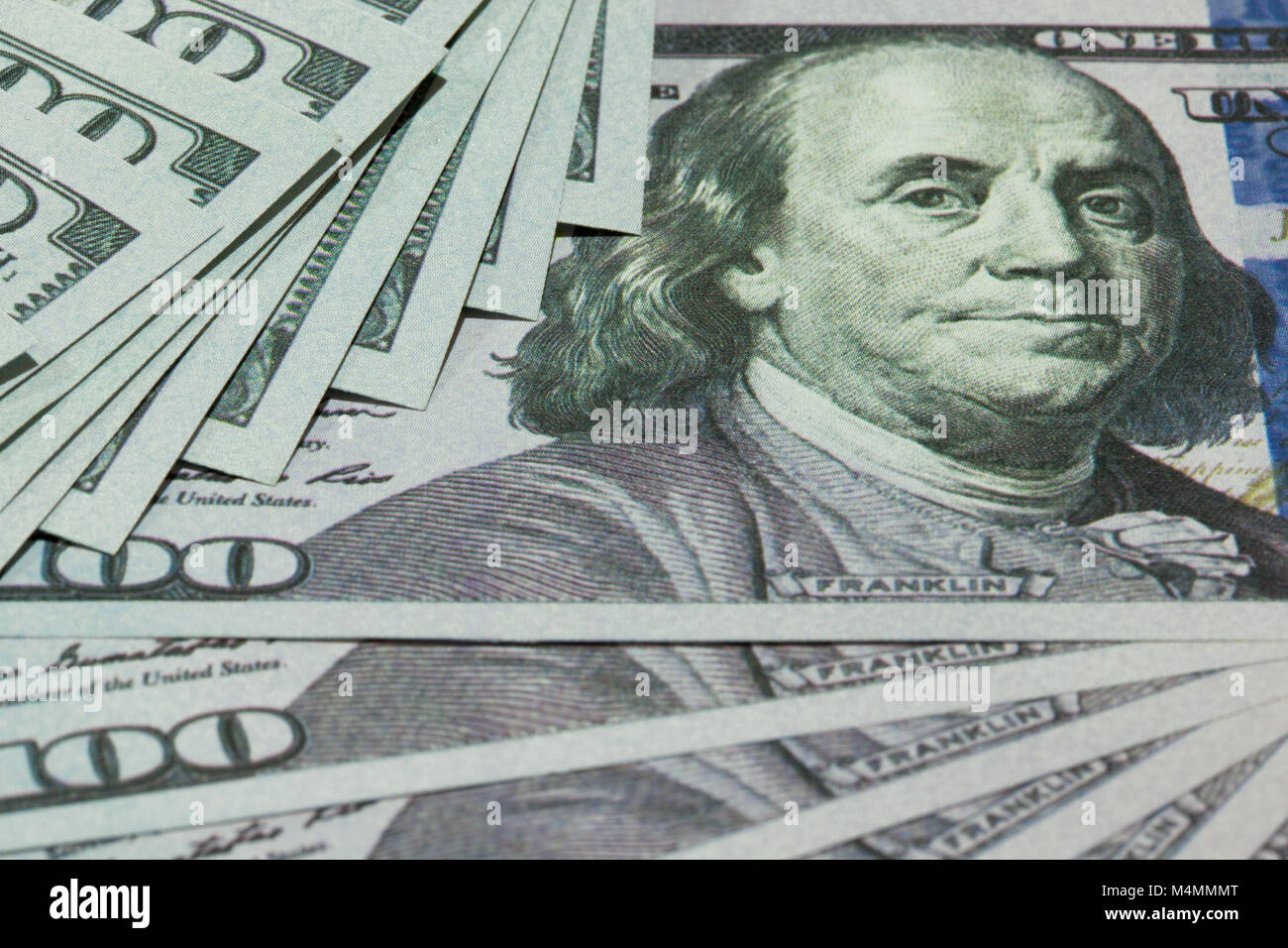 close-up image of an American president on a 100 dollar bill and cache ...