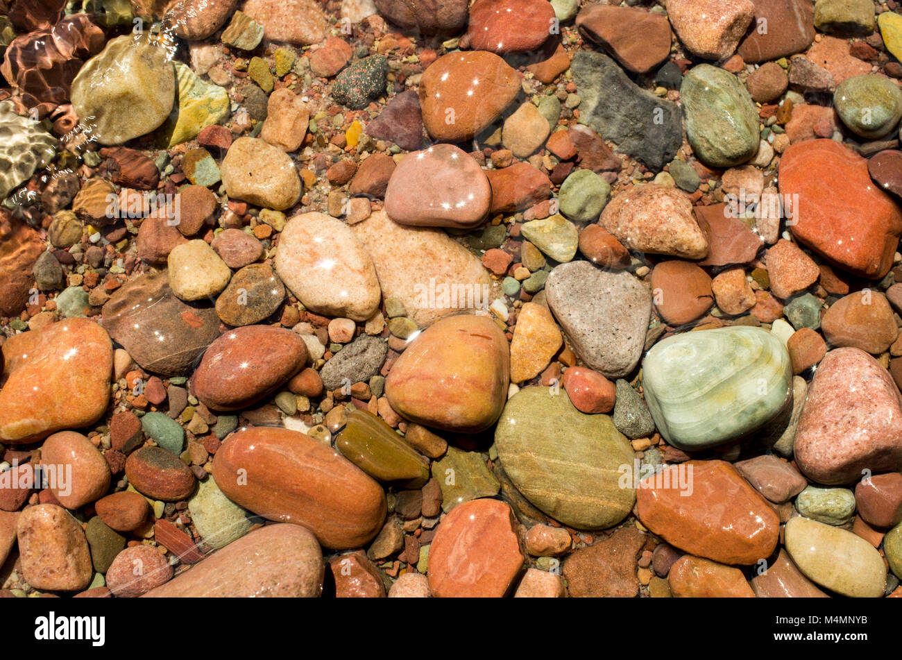 Colorful pebbles on beach hi-res stock photography and images - Alamy