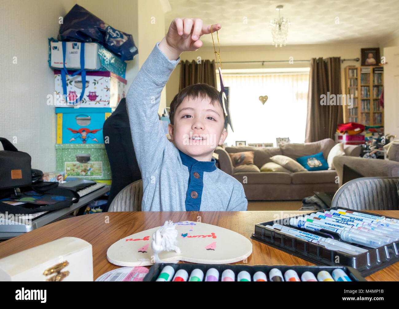 Youngster at the table at home hi-res stock photography and images - Alamy