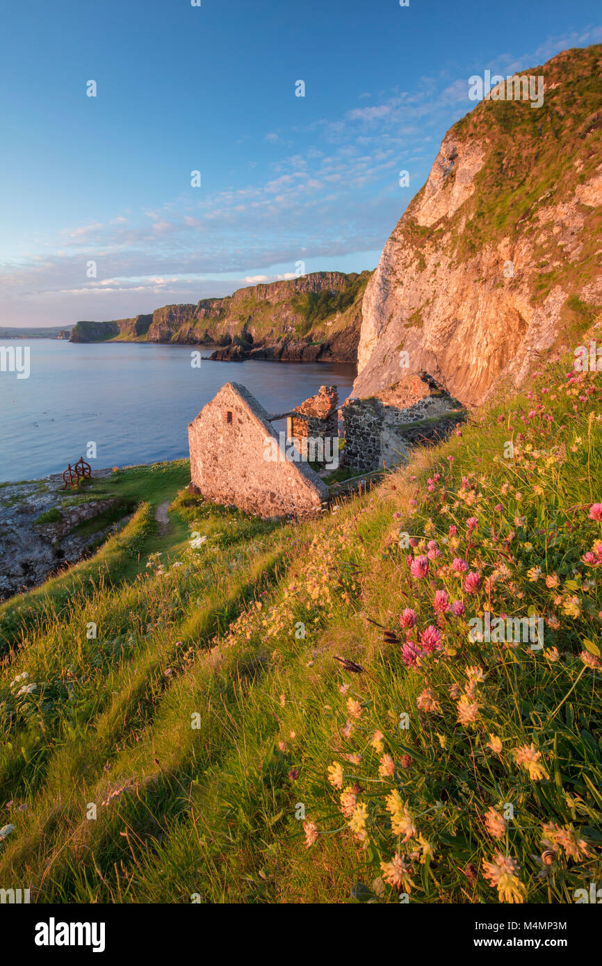 Old fishing cottage beneath the cliffs at Kinbane Head, Ballycastle ...