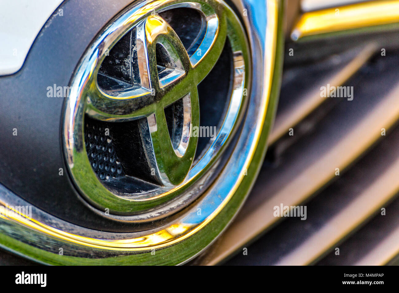 RAVENNA, ITALY - FEBRUARY 14, 2018: dirt covers the Toyota logo. Toyota ...