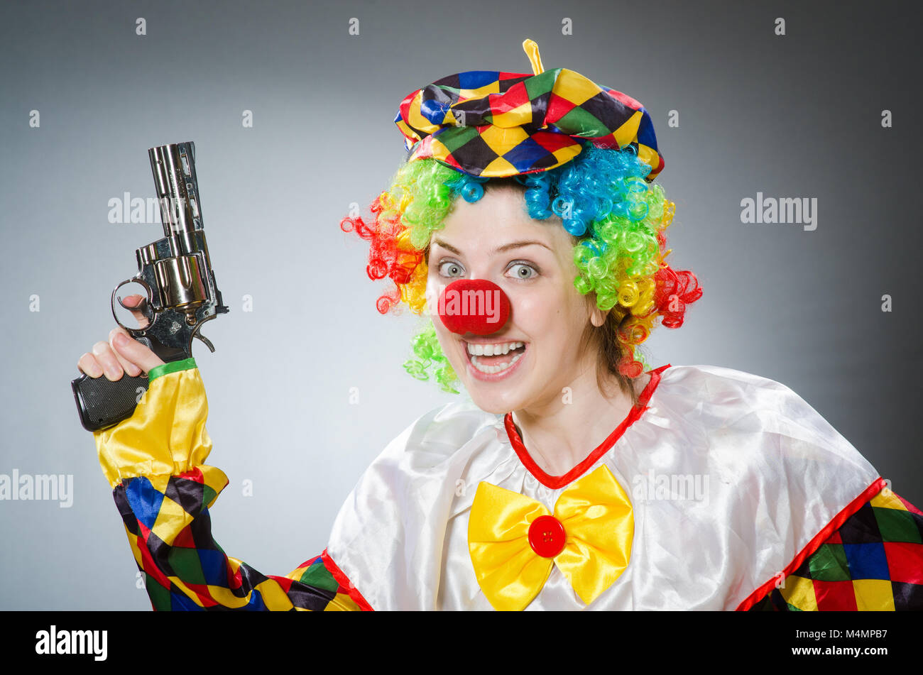 Funny clown in comical concept Stock Photo - Alamy