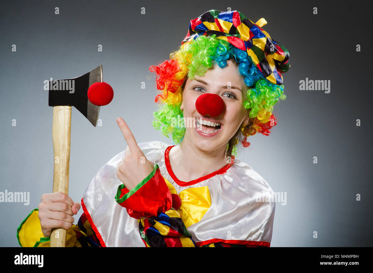 Funny clown in comical concept Stock Photo - Alamy