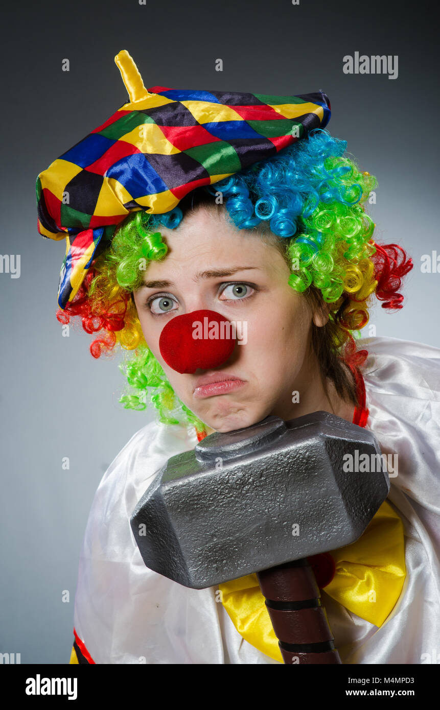 Funny clown in comical concept Stock Photo - Alamy