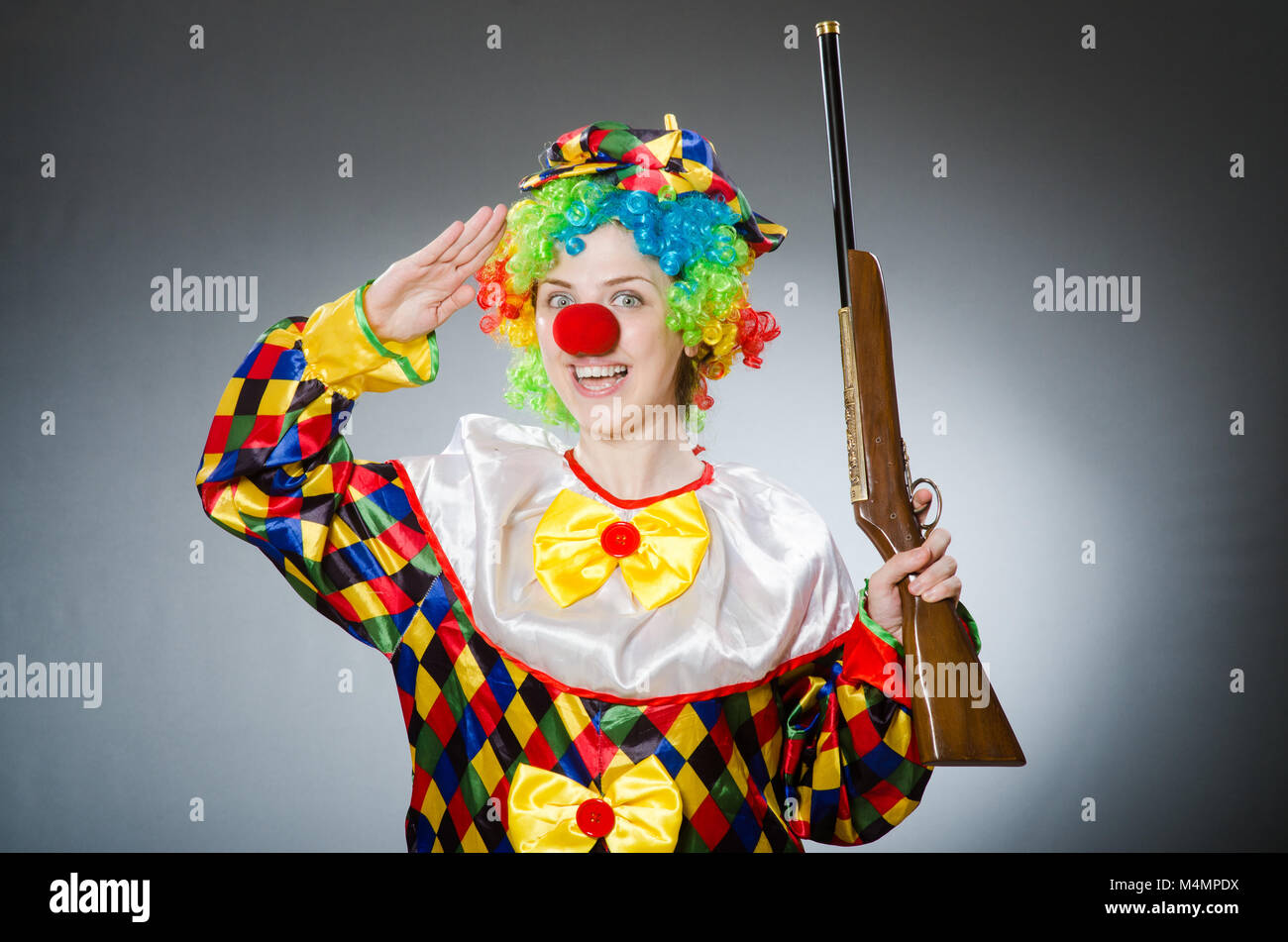 Funny clown in comical concept Stock Photo - Alamy