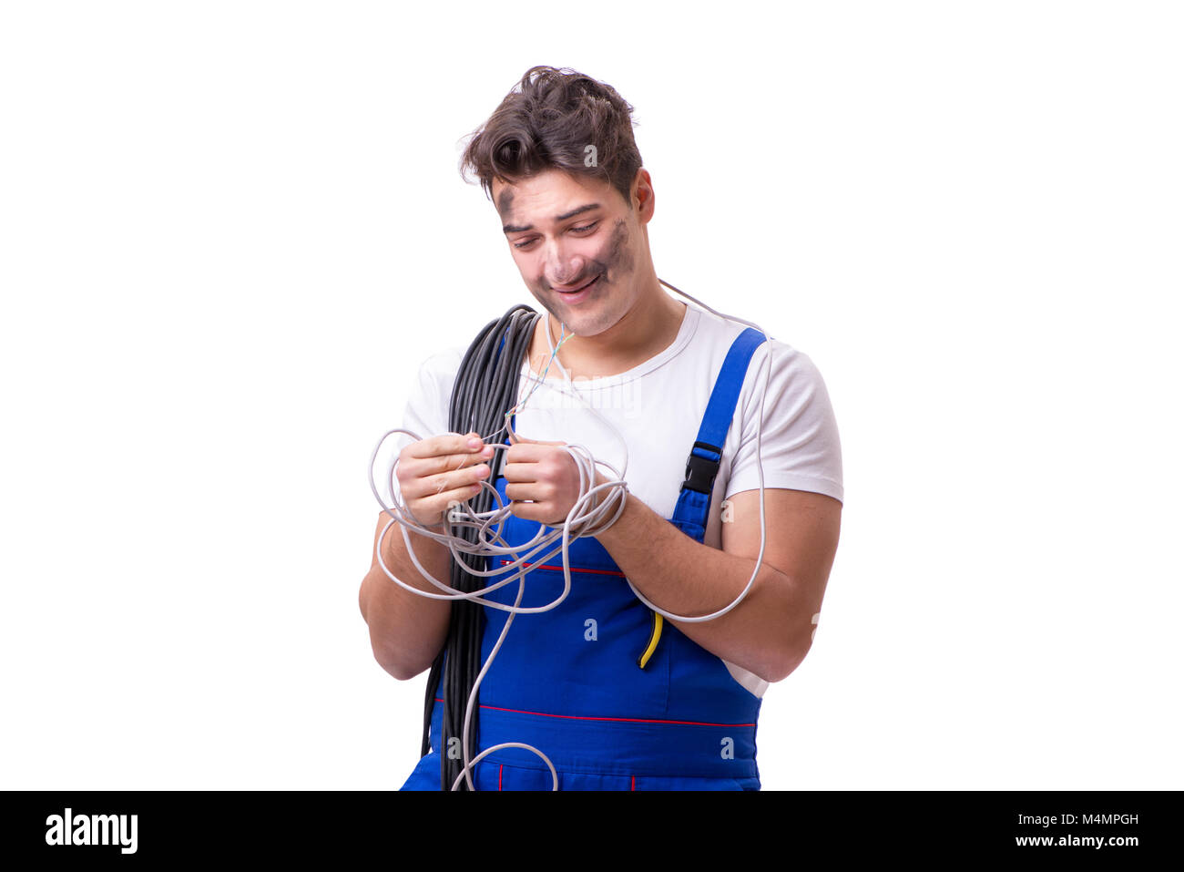Funny man doing electrical repair Stock Photo - Alamy