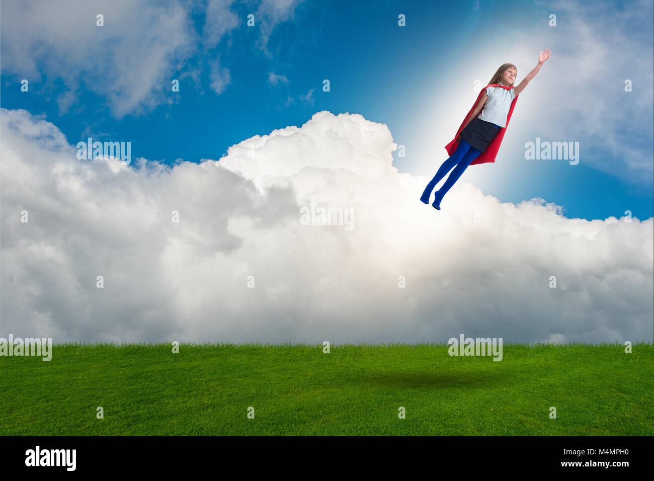 Superhero kid flying in dream concept Stock Photo - Alamy