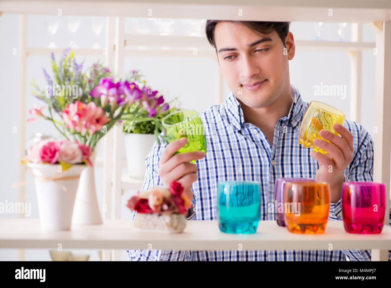 Young handsome man shopping in shop Stock Photo - Alamy