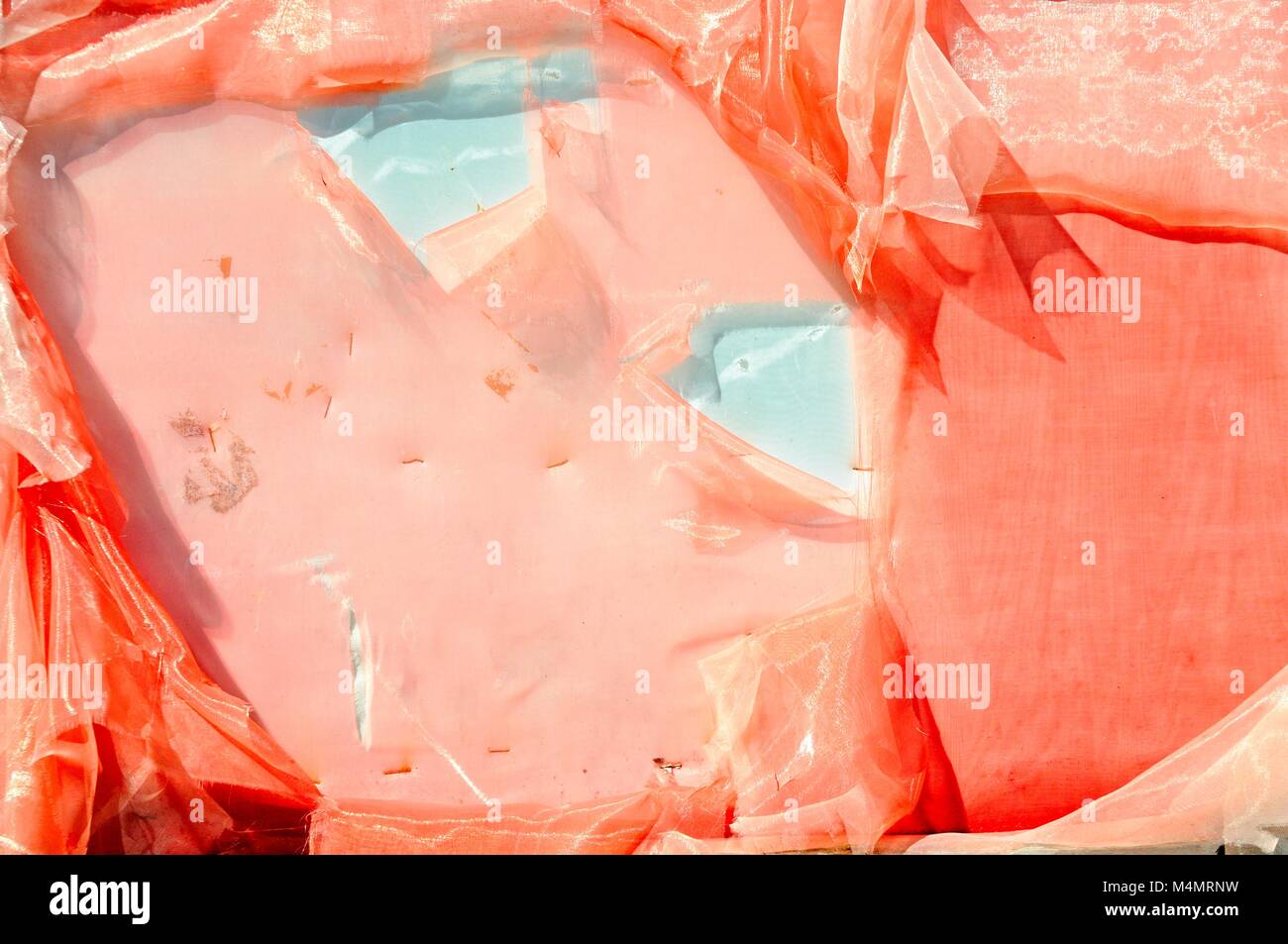 Ripped old silk fabric Stock Photo - Alamy