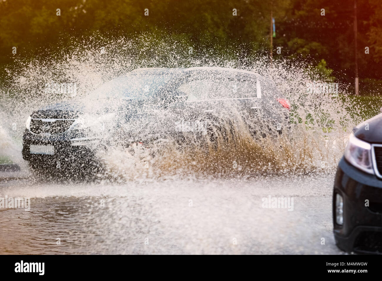 Car splashing hi-res stock photography and images - Alamy