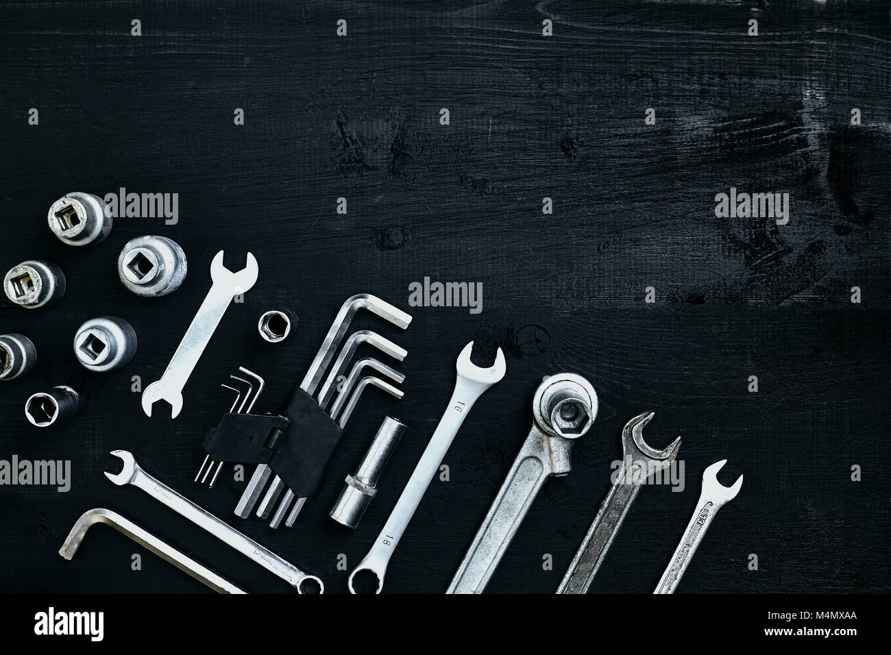 Tools for work or repair auto on black wooden background. Top view ...