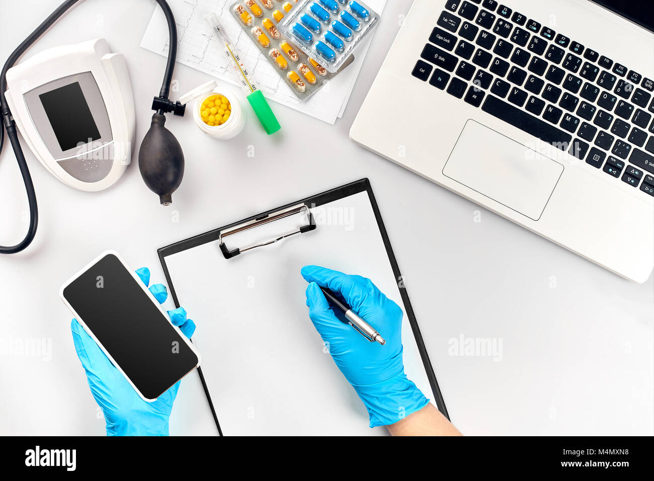 Doctor s table, tools, medical instruments, therapist tonometer, blood ...