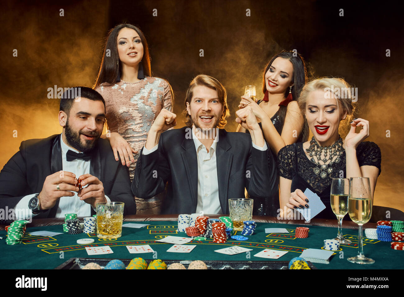 People around poker table hi-res stock photography and images - Alamy