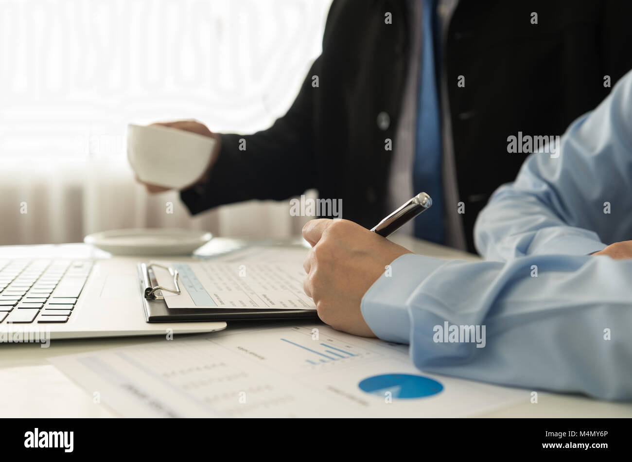 two partner Ideas exchange in the office Stock Photo - Alamy