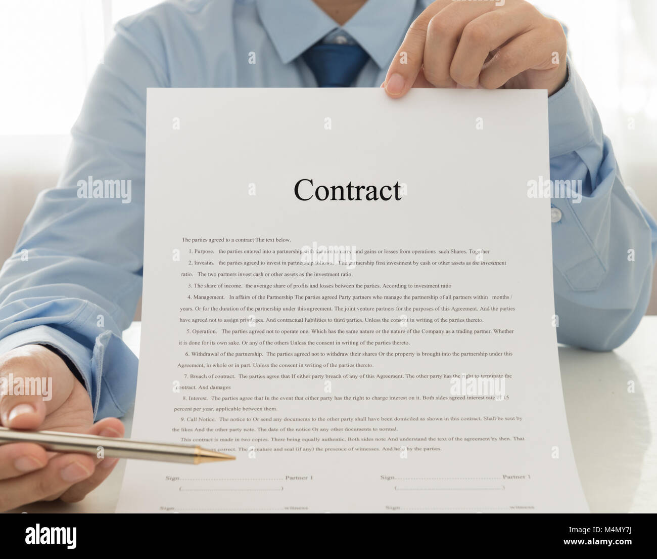 businessman show contract documents that partner must sign Stock Photo ...